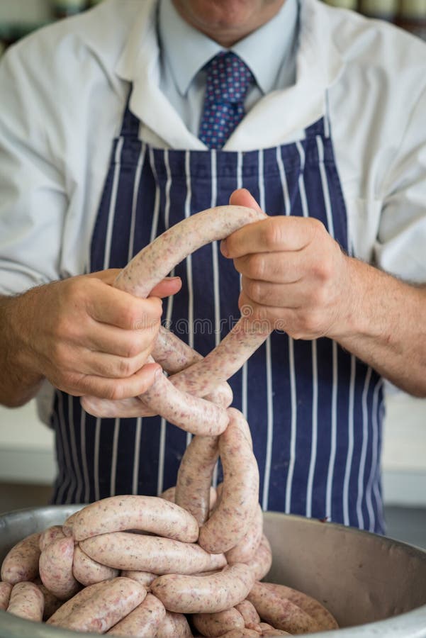 Professional Butcher Making Sausages Stock Photo - Image of apron ...