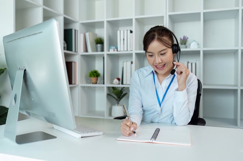 Professional Call Center Agent Working with Headset in Modern Office ...