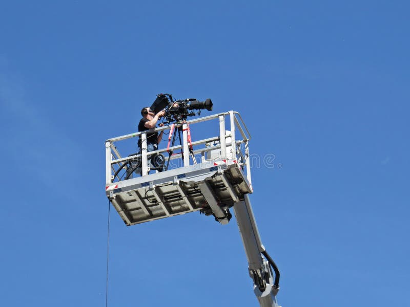 Professional Cameraman Filming And Broadcasting On Platform In City ...