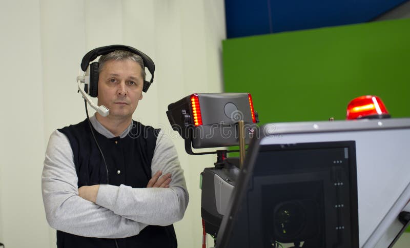 Professional Cameraman Working in a TV Studio. Stock Image - Image of ...