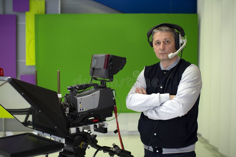 Professional Cameraman Working in a TV Studio. Stock Image - Image of ...