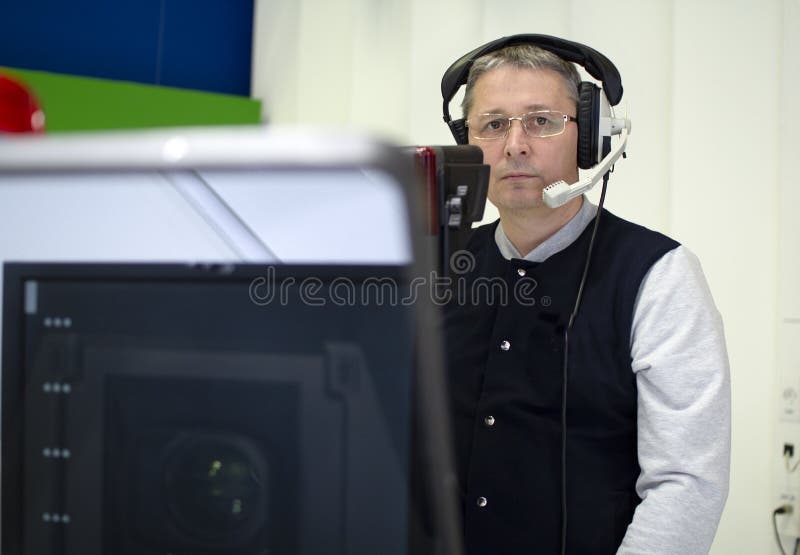 Professional Cameraman Working in a TV Studio. Stock Image - Image of ...