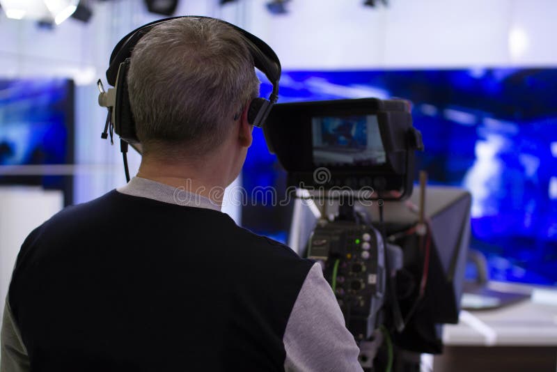 Professional Cameraman Working in a TV Studio. Stock Photo - Image of ...