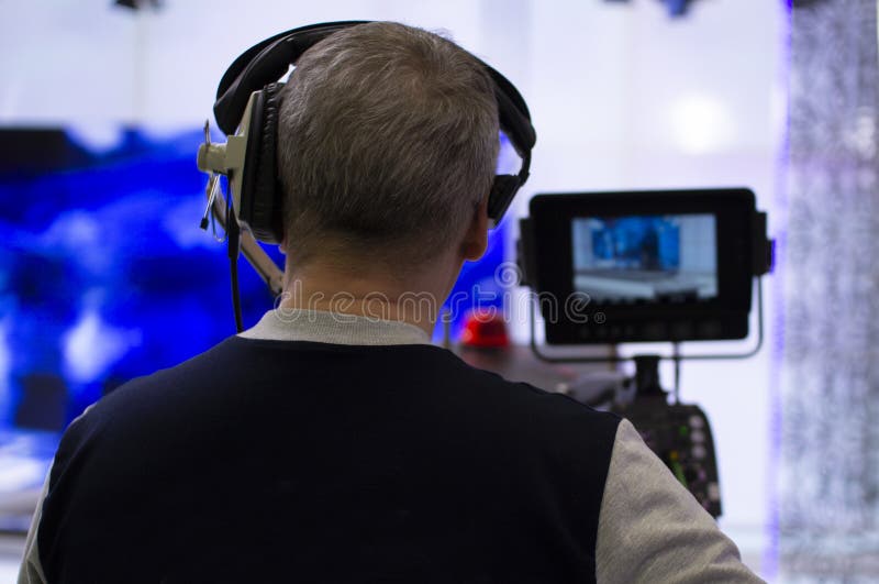 Professional Cameraman Working in a TV Studio. Stock Image - Image of ...