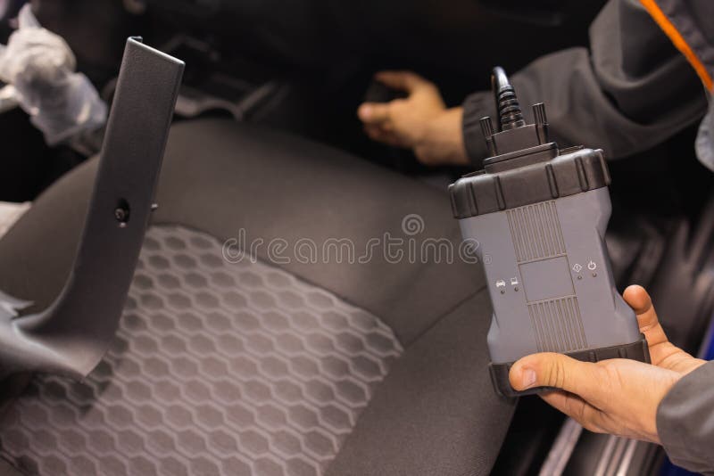 Professional Car Mechanic Working in Auto Repair Service. Stock Image ...