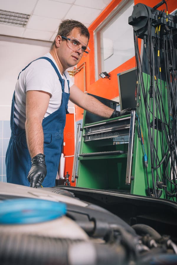 Professional Car Mechanic Working Stock Image - Image of auto, engine ...