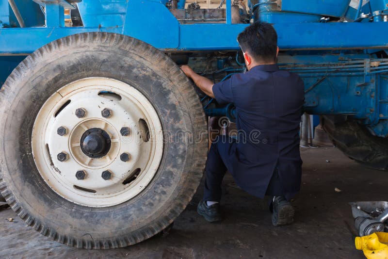 Professional car mechanic stock photo. Image of people - 63142132