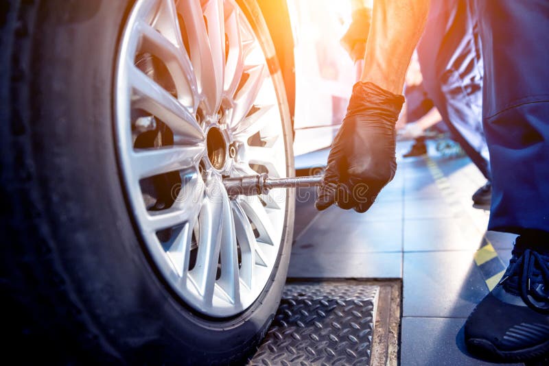 Professional Car Mechanic Working with in Auto Repair Service. Repair ...