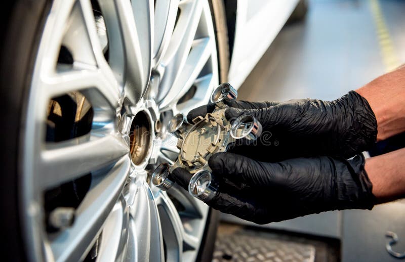 Professional Car Mechanic Working with in Auto Repair Service. Repair ...