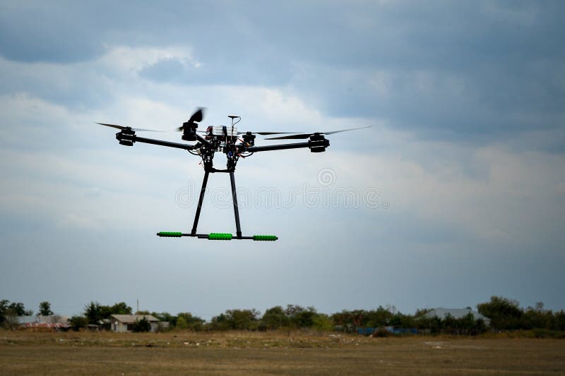 In Flight - Side View of Professional Camera Drone (UAV) Stock Image ...