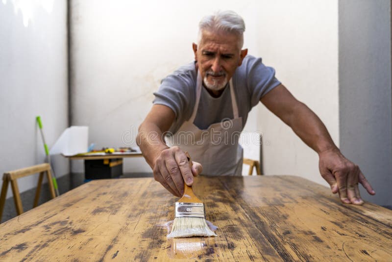 Professional Carpenter is Building a Wooden Table Stock Photo - Image ...