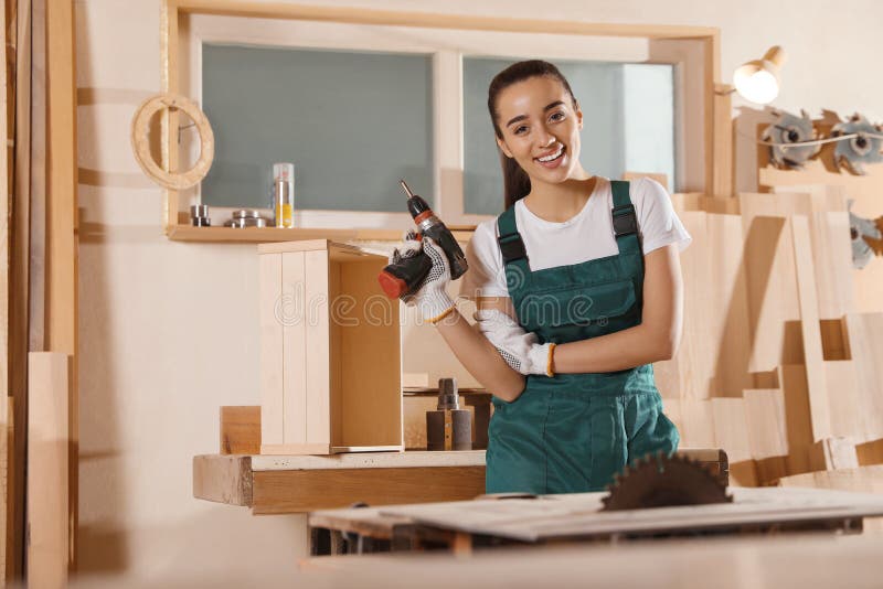 Professional Carpenter in Uniform with Drill Stock Photo - Image of ...