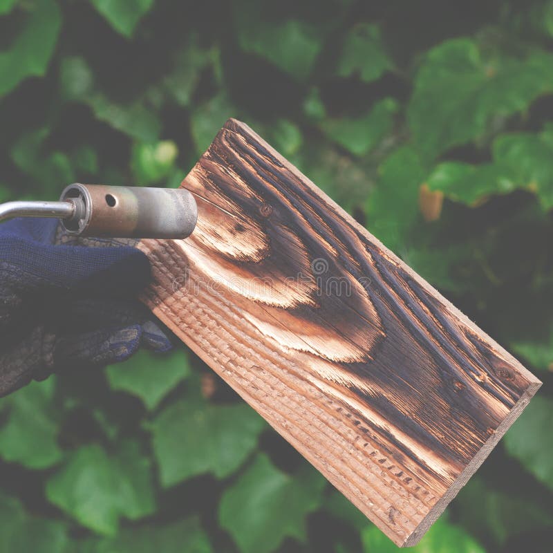 Professional Carpenter Using Old Traditional Technique. Burning Wood ...