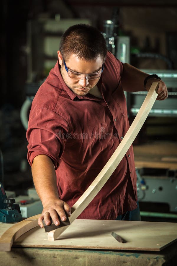 Professional Carpenter at Work. Stock Image - Image of shop, sandpaper ...