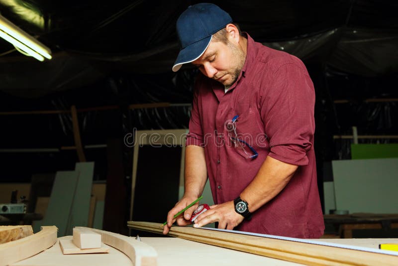Professional Carpenter at Work. Stock Image - Image of home, measuring ...