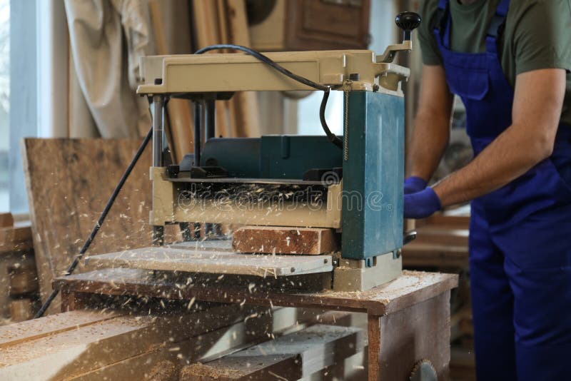 Professional Carpenter Working with Grinding Machine, Closeup Stock ...