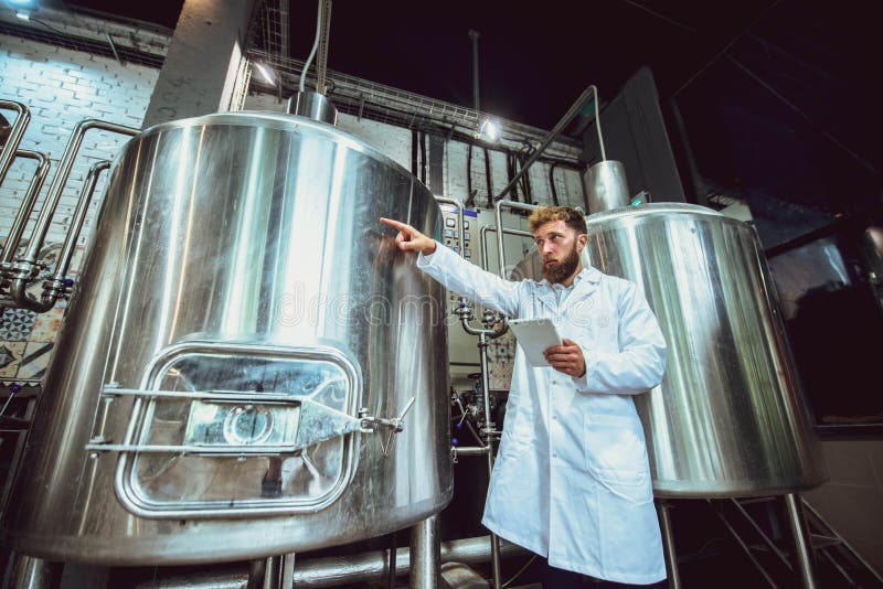 Professional Caucasian Technologist Expert Controlling Industrial ...