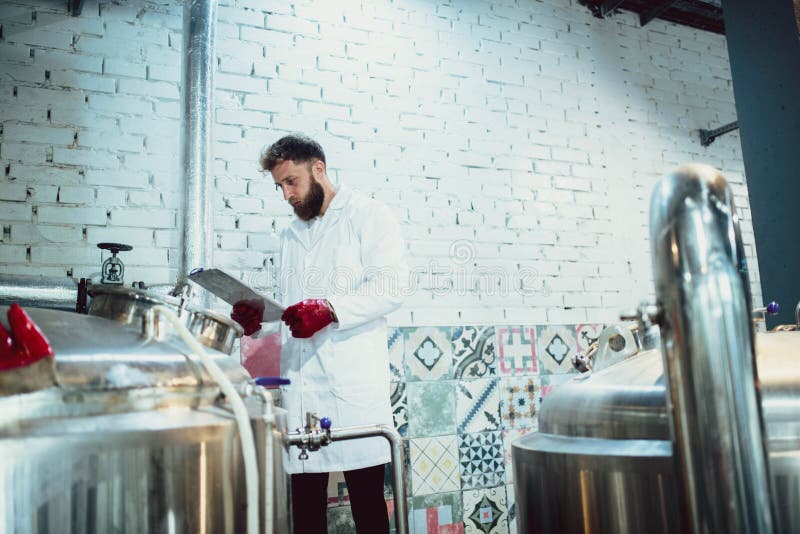 Professional Caucasian Technologist Expert Controlling Industrial ...