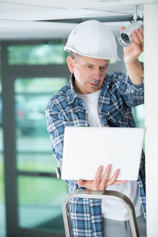Professional Cctv Technician Working Stock Photo - Image of office ...