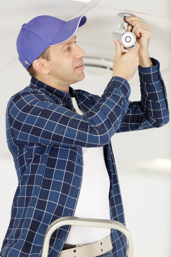 Professional Cctv Technician Working Stock Photo - Image of portrait ...