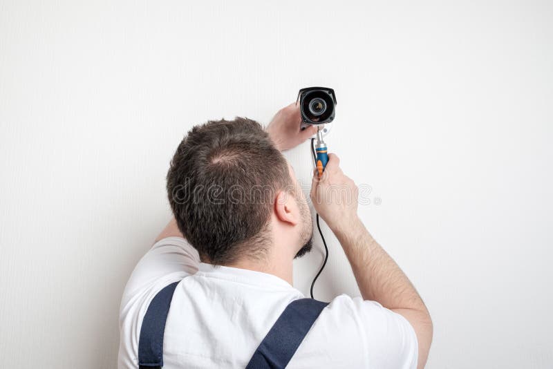 Professional CCTV Technician Working Stock Photo - Image of people ...