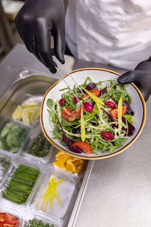 Professional Chef Adding Final Touches To a Vibrant Salad Stock Image ...