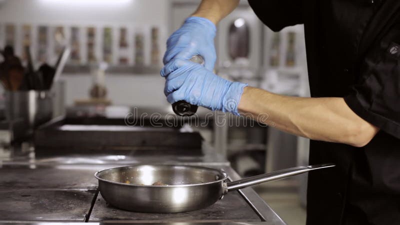 Professional Chef Adding Pepper To Vegetables Frying Pan Stock Footage ...