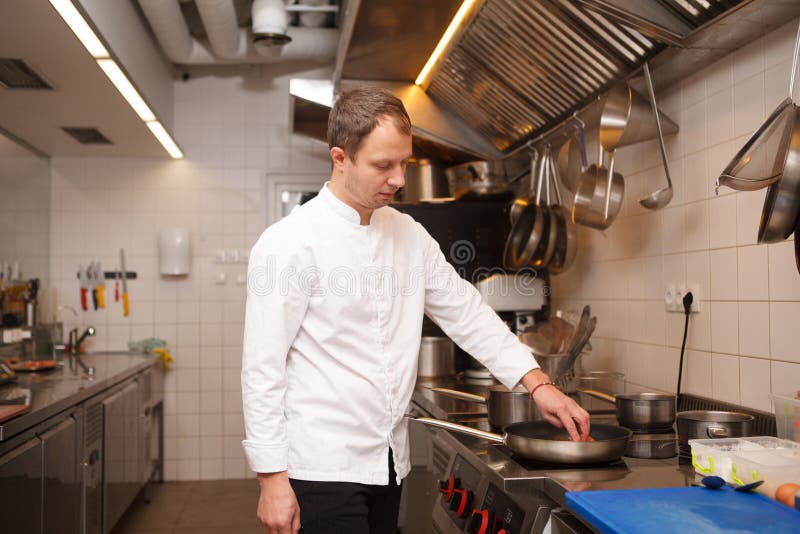 Professional Chef Cooking at the Kitchen Stock Image - Image of cook ...