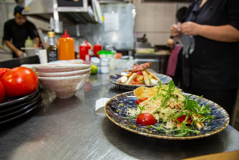 Professional Chef Cooking in the Kitchen Restaurant at the Hotel ...