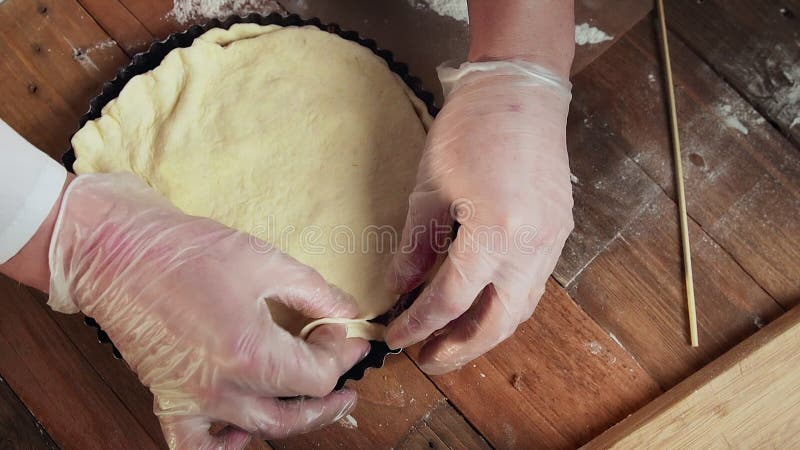 Professional Chef Makes Pie with Meat. Chef Closes Top of Pie Stock ...