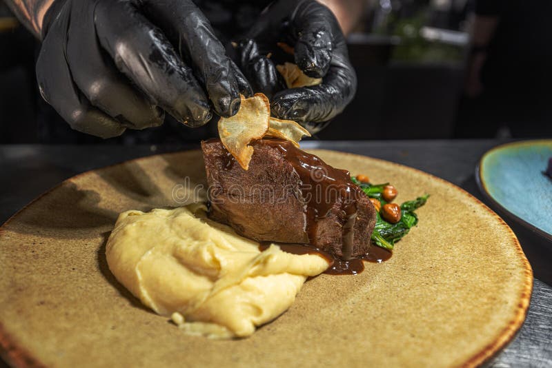 Professional Chef Preparing a Delicious Plated Dish Stock Photo - Image ...
