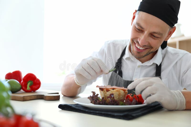 Professional Chef Presenting Dish on Table Stock Image - Image of ...