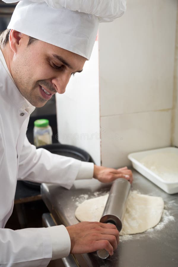Professional Chef Rolls Dough Stock Image - Image of posing, away: 81963001