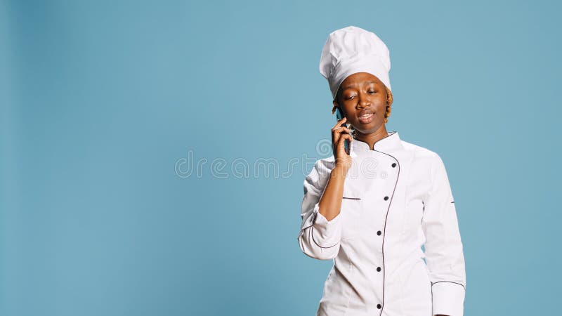 Professional Chef Talking on Phone Call in Studio Stock Image - Image ...