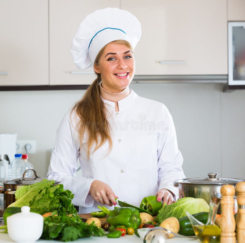 Professional Chef with Vegetables at Kitchen Table Stock Photo - Image ...