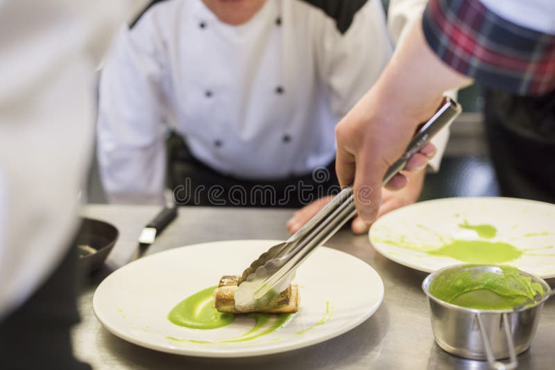 Professional chef at work stock image. Image of front - 85338707
