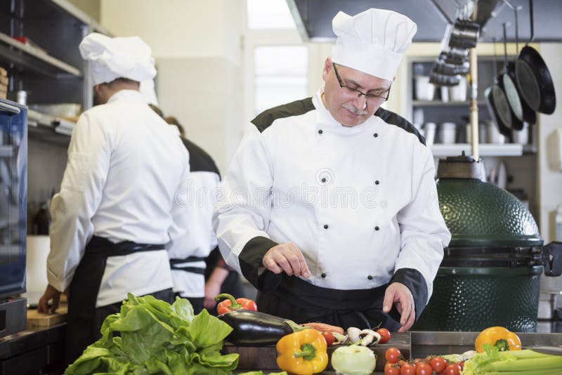 Professional chef at work stock photo. Image of cook - 85336928
