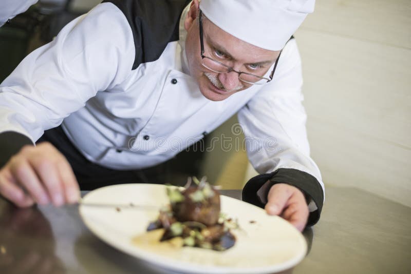 Professional chef at work stock image. Image of leaning - 85344209