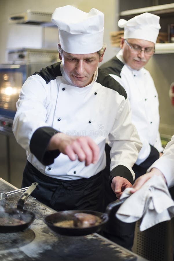 Professional chef at work stock image. Image of drink - 85338915