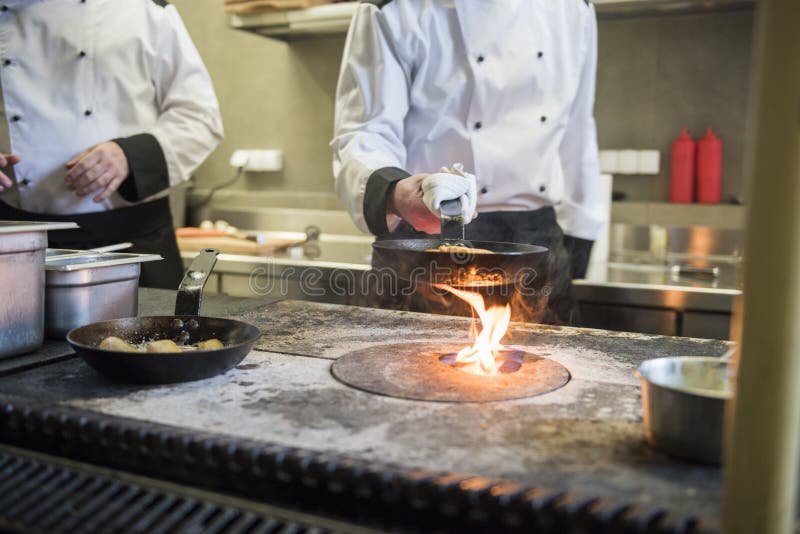 Professional chef at work stock image. Image of fine - 85337703