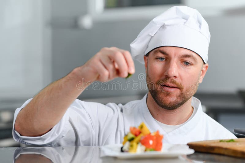 Professional Chef Working in a Famous Restaurant Kitchen Stock Photo ...