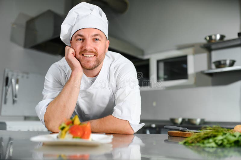 Professional Chef Working in a Famous Restaurant Kitchen Stock Photo ...