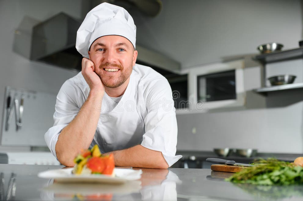 Professional Chef Working in a Famous Restaurant Kitchen Stock Photo ...