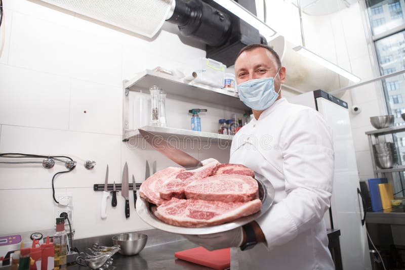 Professional Chef Working at Restaurant Kitchen Stock Photo - Image of ...