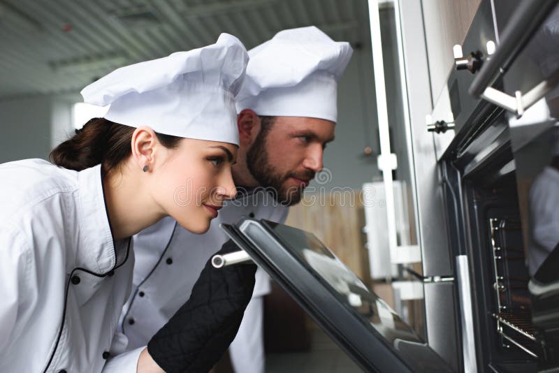 Professional Chefs Looking into Modern Stock Photo - Image of chefs ...