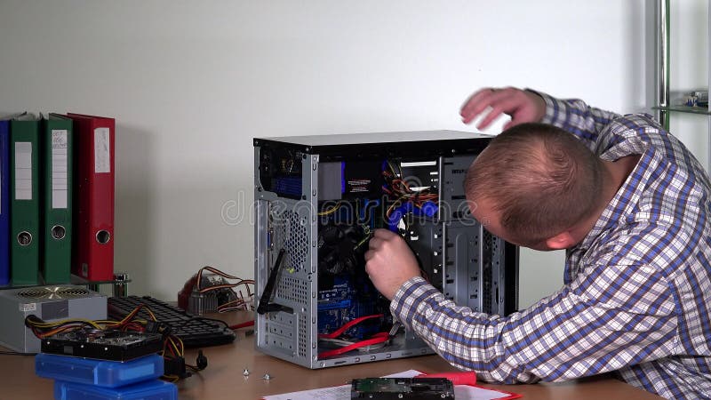 Computer Repairer Put Protective Gloves on Hands. Computer Case and ...