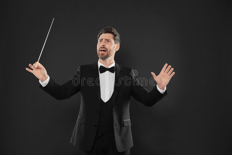 Professional Conductor with Baton on Black Background Stock Image ...