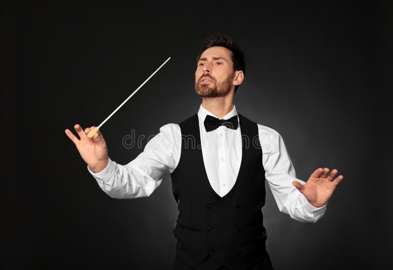 Professional Conductor with Baton on Black Background Stock Image ...