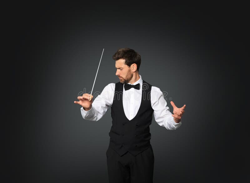 Professional Conductor with Baton on Black Background Stock Photo ...