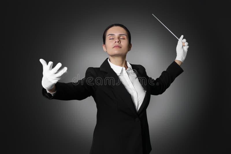 Professional Conductor with Baton on Black Background Stock Photo ...